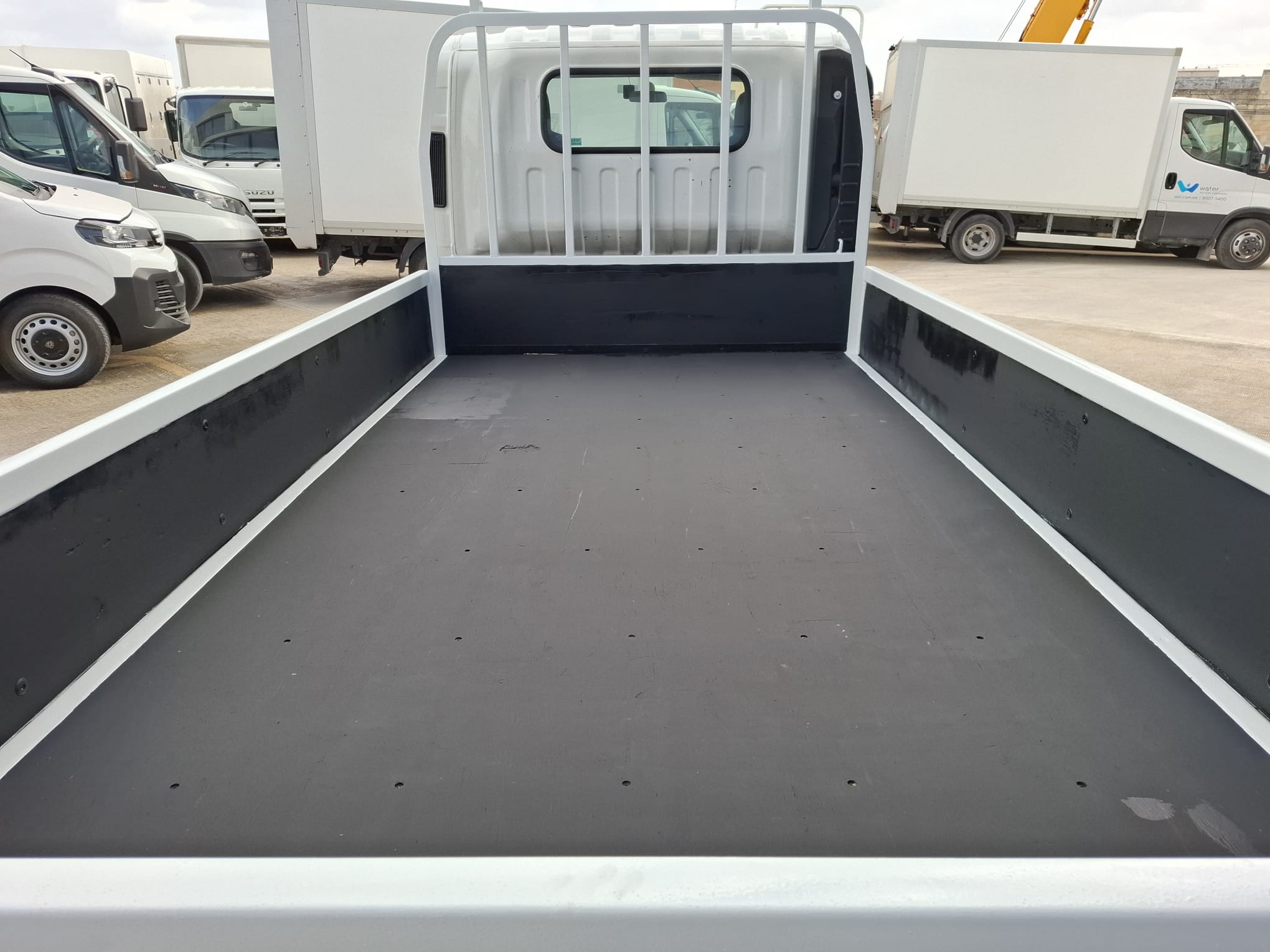 Isuzu Elf 12ft Dropside Truck - 2017 Model - Burmarrad Group