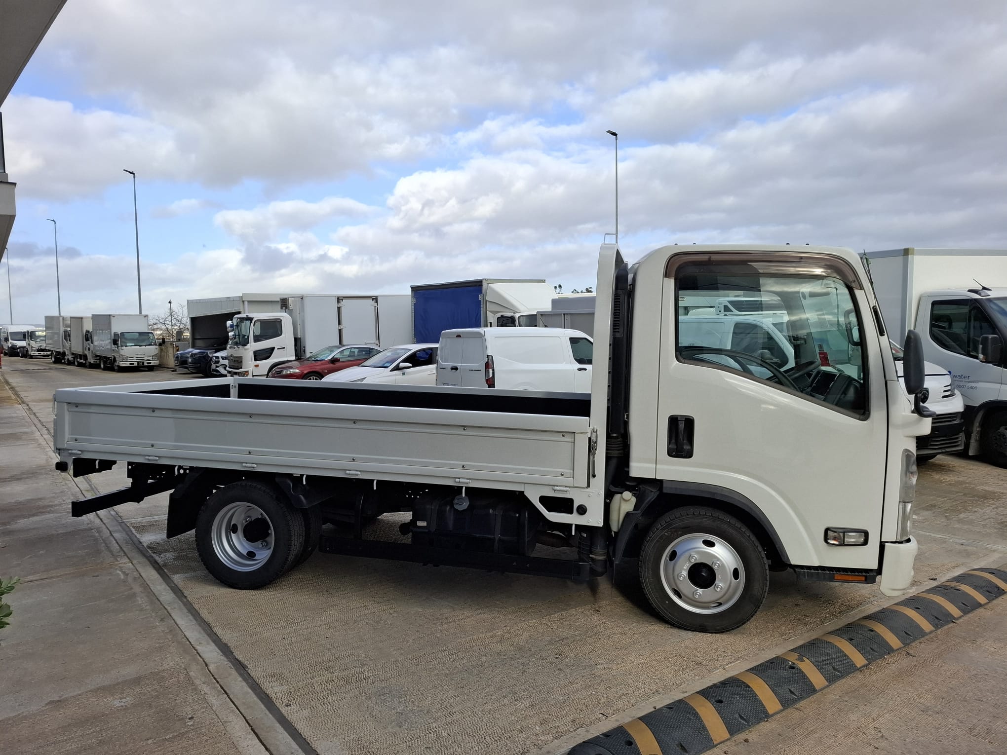Isuzu Elf 12ft Dropside Truck - 2017 Model - Burmarrad Group