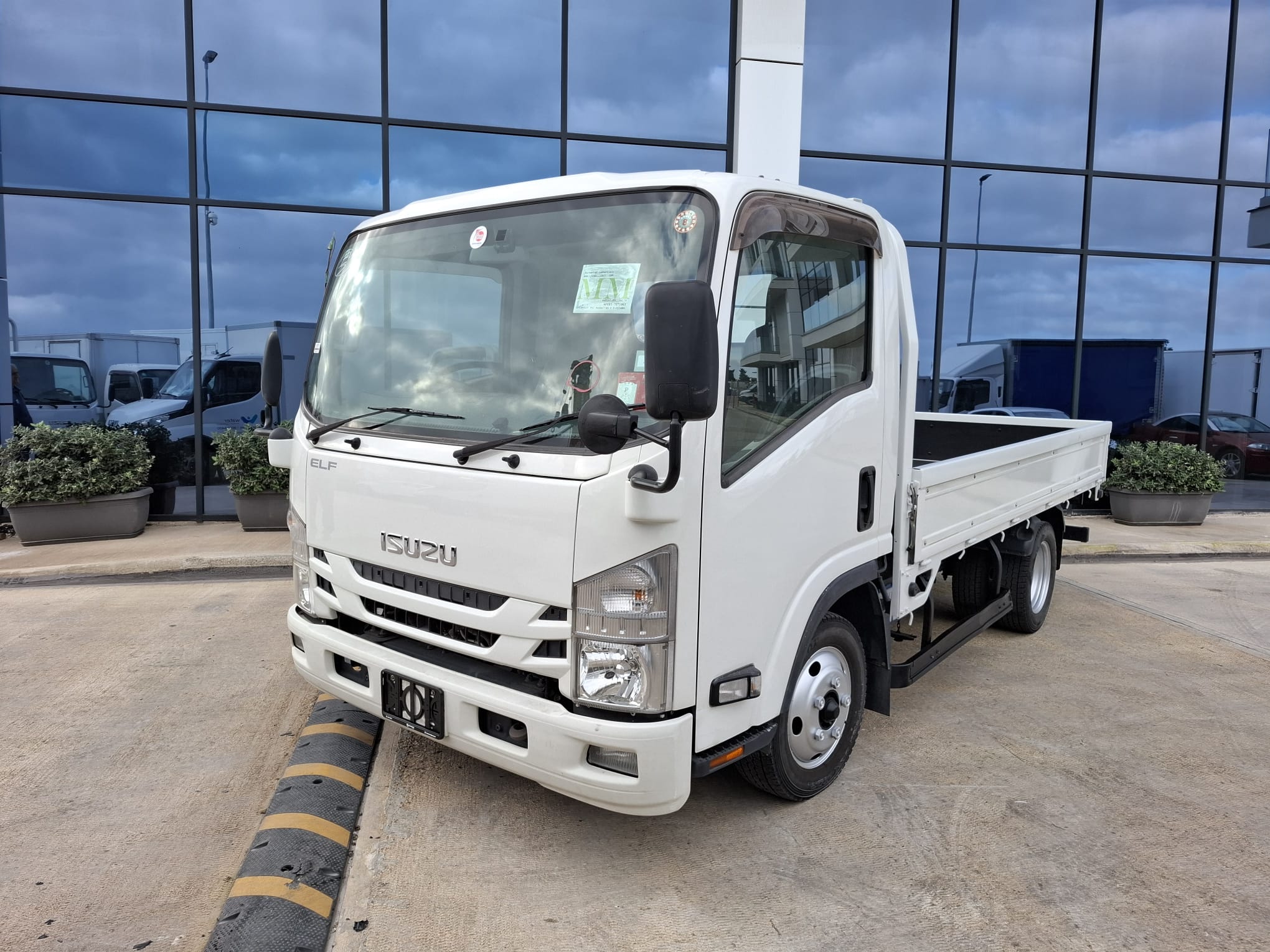 Isuzu Elf 12ft Dropside Truck - 2017 Model - Burmarrad Group